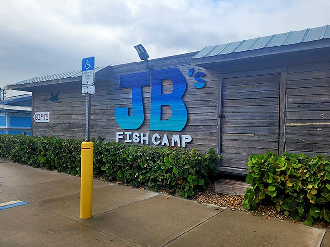 The weathered wooden exterior and bold blue sign announce you've arrived at seafood paradise. Florida authenticity doesn't get more real than this.
