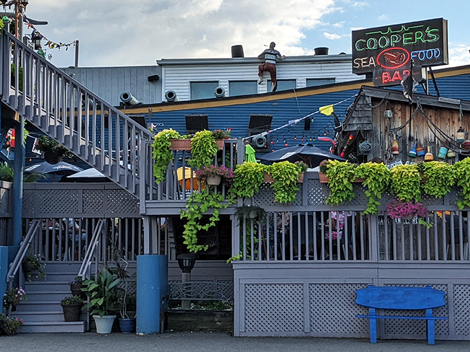 The blue exterior of Cooper's Seafood House stands like a landlocked lighthouse in Scranton, complete with deck seating that screams "summer vacation all year round!"