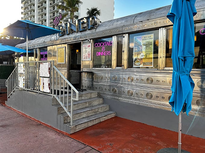 The gleaming stainless steel exterior of 11th Street Diner shines like a beacon of nostalgia under Miami's blue skies, promising comfort food and air conditioning in equal measure.