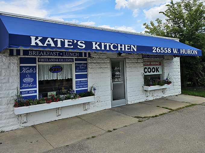 The unassuming exterior of Kate's Kitchen might not stop traffic, but locals know this humble white building houses breakfast magic worth any detour.