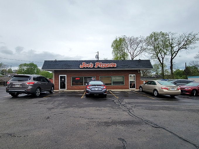 The brick facade of Joe's Pizzeria stands like a time capsule under Ohio skies, promising pizza perfection that's remained unchanged while the world around it spins madly on. 