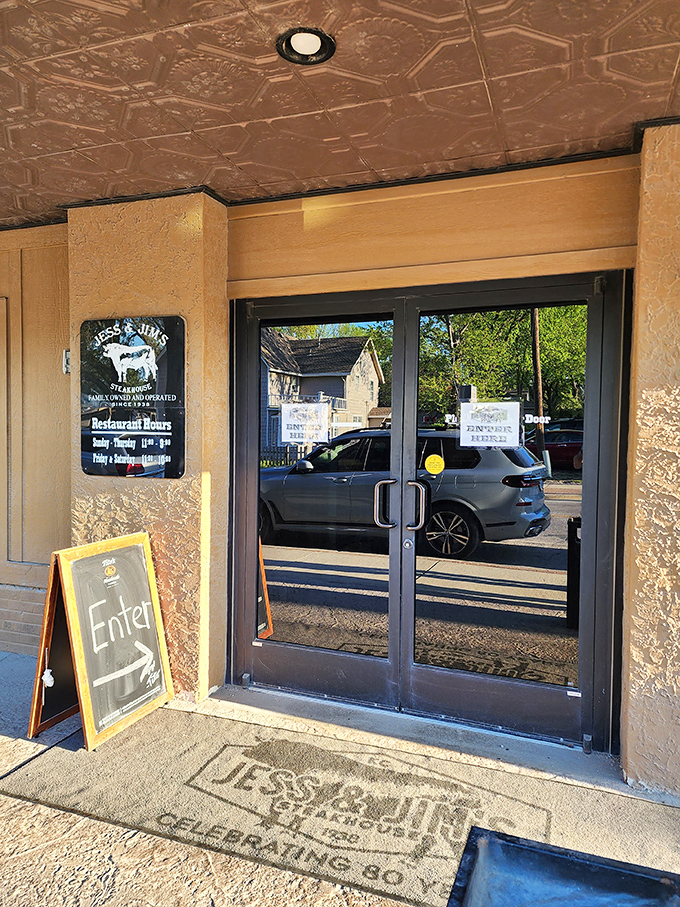 The unassuming brick exterior of Jess & Jim's stands like a temple to beef worship, complete with a vintage sign that's seen decades of hungry pilgrims.
