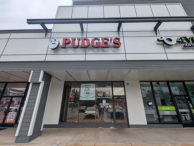 The storefront beckons like a lighthouse for the hungry. Pudge's bold red sign promises salvation from ordinary sandwiches in suburban Blue Bell.