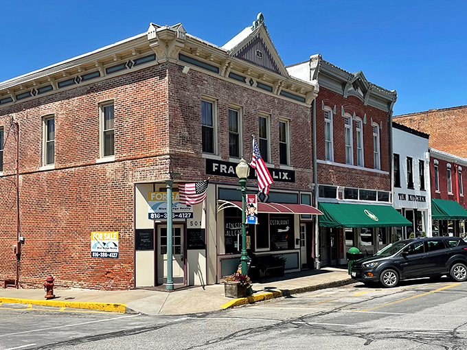Main Street Weston whispers stories of riverboat days while modern cars line up like patient time travelers waiting their turn.