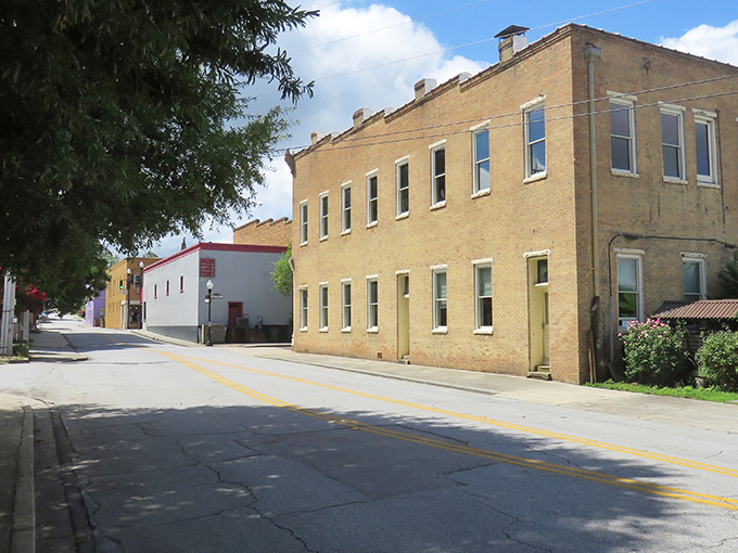 Historic brick buildings line Newberry's quiet streets, where time seems to move at a more civilized pace than the frantic outside world.