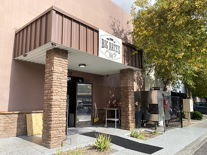 The unassuming exterior of Big Nate's Family BBQ in Mesa hides culinary treasures within, like a smoke-scented speakeasy for barbecue enthusiasts.