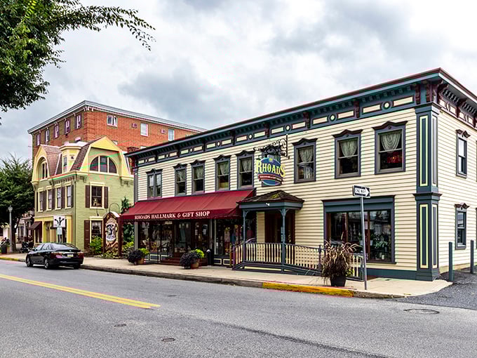 Palermo's Pizza stands as a colorful sentinel on Hummelstown's Main Street, where red umbrellas beckon like culinary lighthouses guiding hungry travelers home.