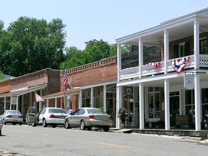 Arrow Rock unfolds like a living watercolor painting, its autumn-tinged trees and historic rooftops creating a scene worthy of a PBS special.
