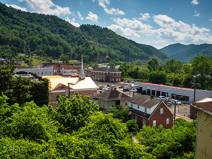 Logan's downtown nestles perfectly between verdant mountains, like a movie set where Appalachian charm meets real-world grit and unexpected beauty.
