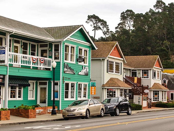 Main Street magic unfolds where colorful Victorian buildings create a storybook setting that Walt Disney would envy.