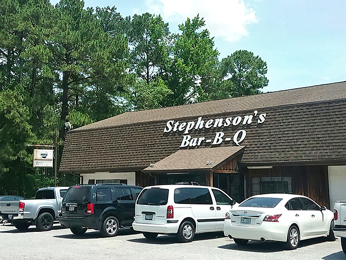 The unassuming exterior of Stephenson's Bar-B-Q stands like a barbecue time capsule, promising authentic flavors that no fancy facade could improve upon.
