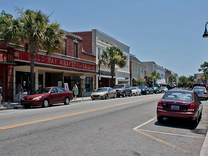Bay Street's colorful storefronts invite leisurely exploration, where brick buildings house boutiques and eateries that locals have treasured for generations.