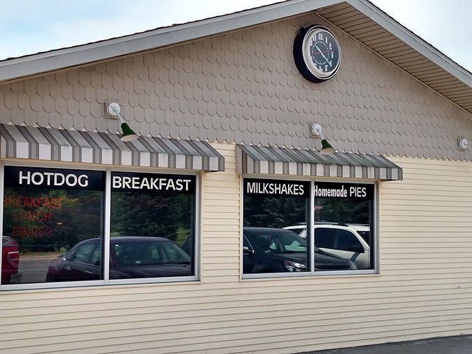 The unassuming exterior of Nutcracker Family Restaurant hides culinary treasures within. Those striped awnings practically whisper, "Come in, the pie is waiting."