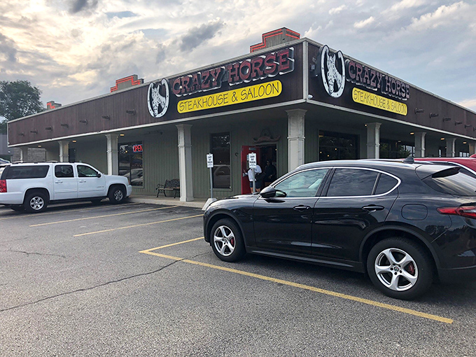 The unassuming exterior of Crazy Horse Steakhouse & Saloon proves once again that the best culinary treasures often hide in plain sight.