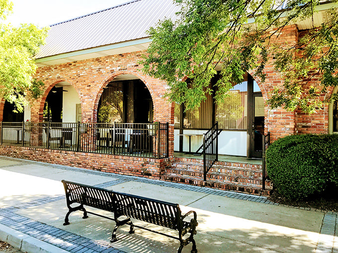 The unassuming brick exterior of The Plaza Restaurant hides culinary treasures within, like finding a diamond in your grandmother's jewelry box.