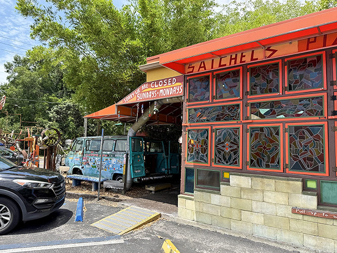 The vibrant exterior looks like what would happen if Willy Wonka opened a pizza joint in Florida instead of a chocolate factory.