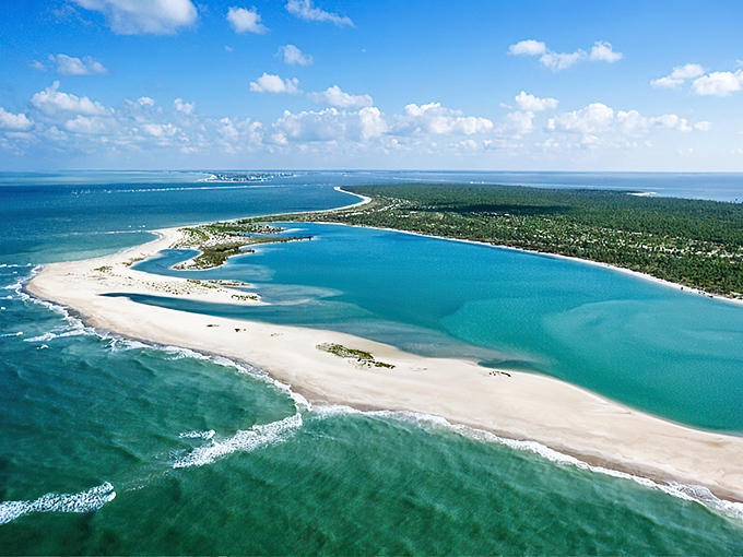 Paradise from above: where turquoise waters meet pristine white sand, creating Florida's version of heaven without the crowds or cocktail umbrellas.