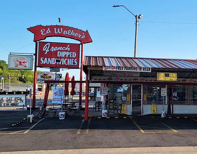 The neon glow of Ed Walker's iconic sign beckons hungry travelers like a lighthouse for empty stomachs. Americana doesn't get more authentic than this.