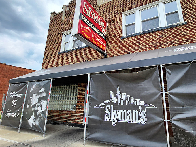 The iconic red sign beckons like a lighthouse for sandwich lovers. Cleveland's corned beef cathedral stands ready to welcome hungry pilgrims.
