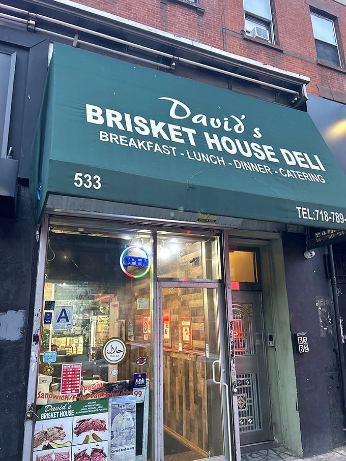 A beacon of brisket brilliance! David's Brisket House stands proud, its green awning a siren call to sandwich lovers everywhere.