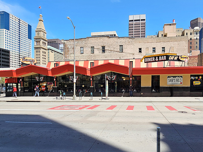 The neon glow of Sam's No. 3 against Denver's skyline isn't just a sign&mdash;it's a beacon of culinary comfort calling hungry souls home.