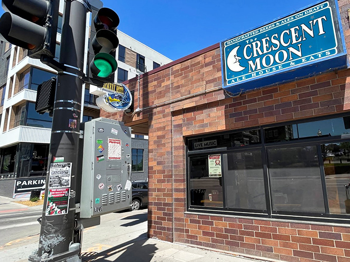 The iconic blue moon signage beckons hungry travelers like a portal to sandwich paradise. Nebraska's culinary landmark hides in plain sight.