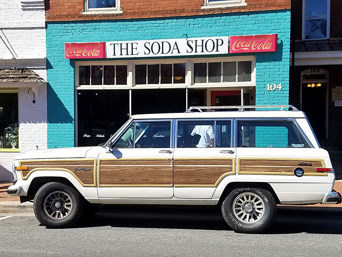 The turquoise facade of The Soda Shop stands out like a nostalgic beacon on Davidson's Main Street, promising comfort and conversation in equal measure.