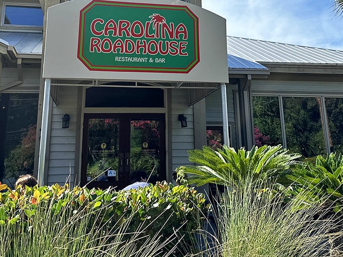 The unassuming exterior of Carolina Roadhouse hides culinary treasures within, like finding a secret speakeasy that serves prime rib instead of bathtub gin.