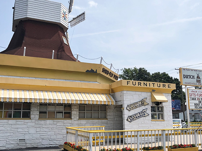 The iconic windmill atop Dutch Haven isn't just for show—it's been guiding hungry travelers to shoofly pie paradise for generations along Lincoln Highway.