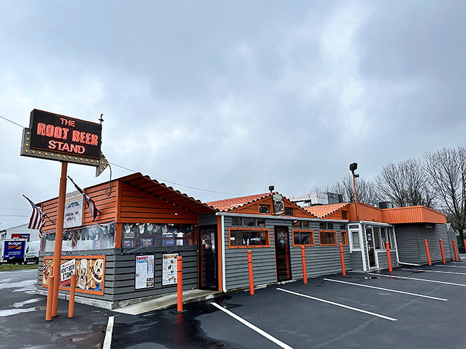 The iconic orange-trimmed exterior stands like a time capsule on Reading Road, its vintage sign promising simple pleasures that never go out of style. 