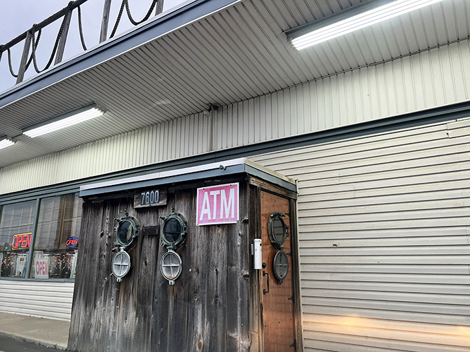 The nautical entrance to Under the Pier looks like a movie set&mdash;wooden posts, rope barriers, and a vibrant hand-painted sign that practically shouts "fresh seafood inside!"