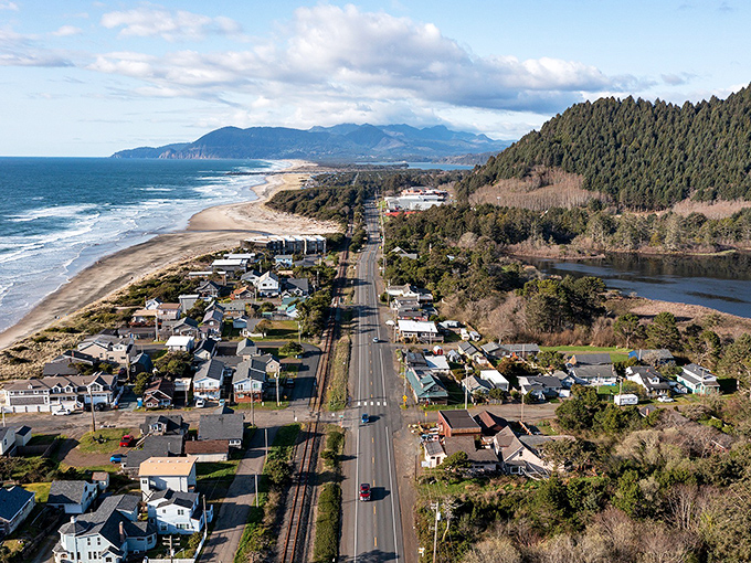 Aerial dreams come true: where forest-cloaked mountains dive dramatically into the Pacific, with Manzanita's charming grid of streets connecting it all.