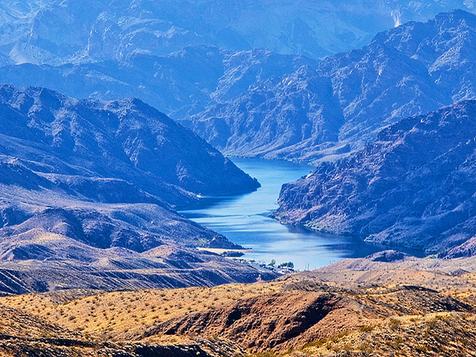 Mother Nature showing off her best work&mdash;the Colorado River carving through ancient rock like a master sculptor with infinite patience.