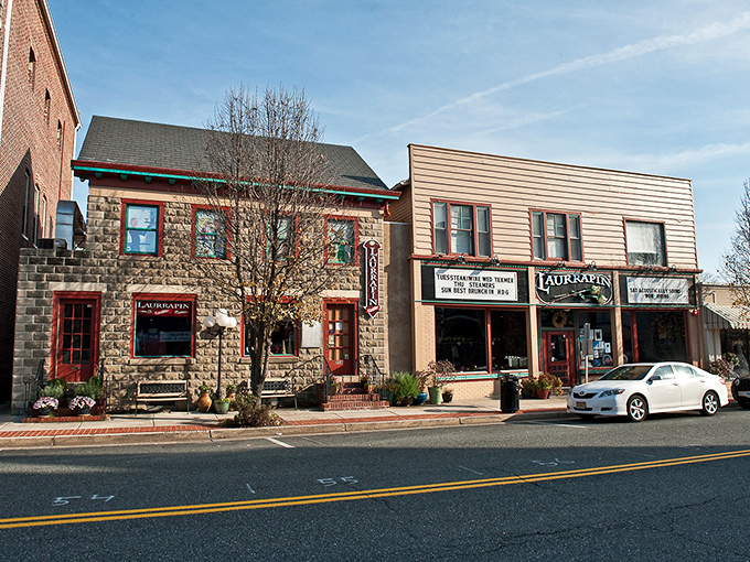 Historic storefronts along Washington Street showcase Havre de Grace's architectural charm, where Laurrapin Grille's stone facade beckons hungry travelers with promises of Chesapeake cuisine.