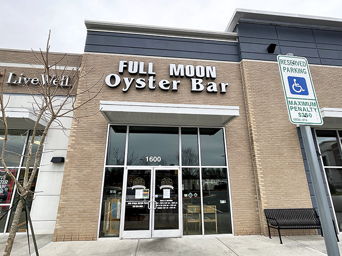 The unassuming strip mall exterior hides seafood treasures within, like finding a pearl in an unexpected oyster.