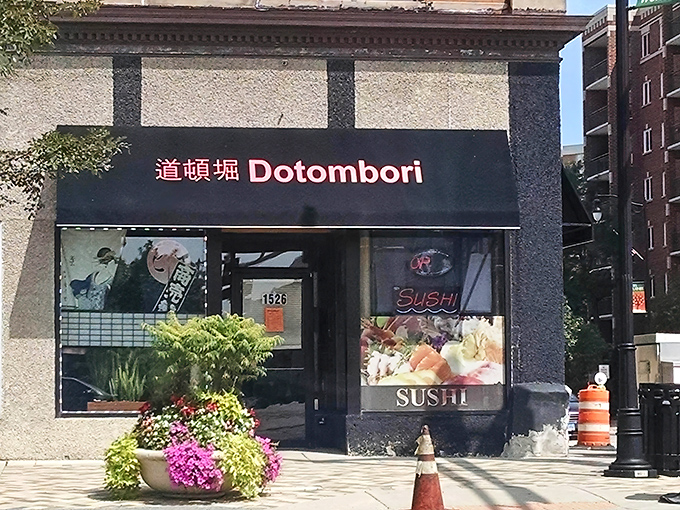 The unassuming storefront of Dotombori beckons with its glowing red signage &ndash; like finding a rare vinyl record in a discount bin.