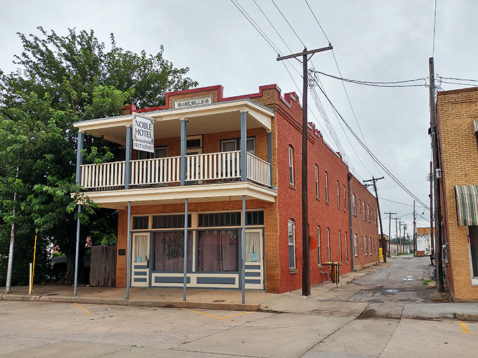 Historic brick buildings stand sentinel on Watonga's Main Street, their weathered facades telling stories of generations who've called this affordable haven home.