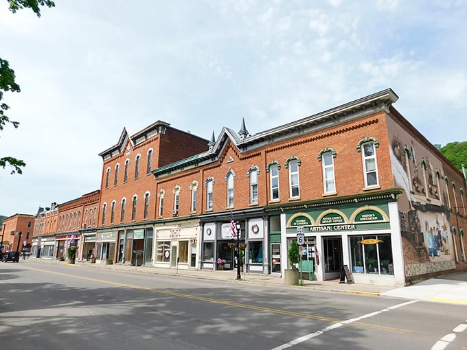 Main Street Coudersport welcomes visitors with its classic brick facades and small-town charm, where time seems to slow down just enough to savor life's simple pleasures.