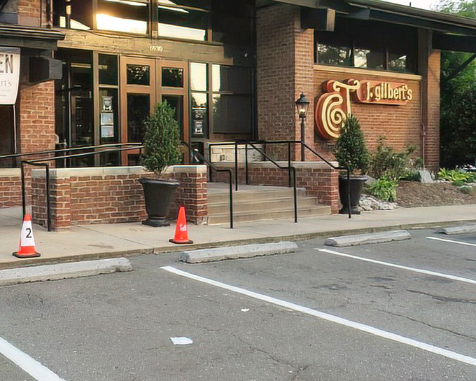 That distinctive brick facade and elegant signage promise culinary adventures that'll make your neighbors jealous of your dinner plans.
