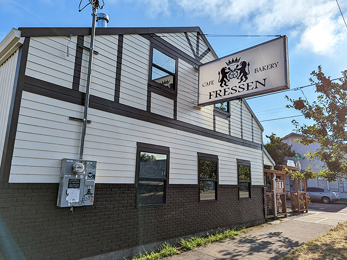 Fressen's charming exterior welcomes you with rustic wooden accents and a covered patio—like finding a secret European café tucked away in Northeast Portland.