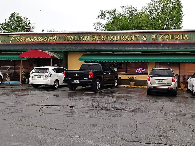 The cheerful yellow exterior with its red and green awnings isn't just inviting&mdash;it's practically shouting "authentic Italian food inside!" like a culinary town crier.
