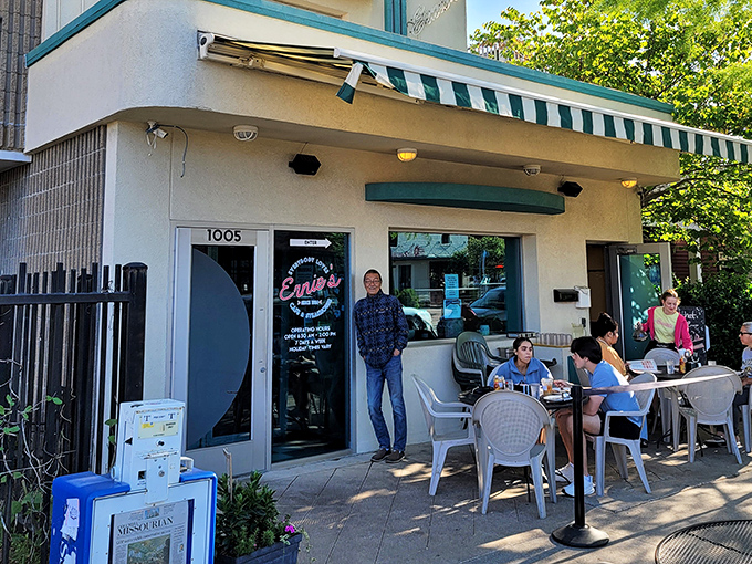 Ernie's welcoming exterior beckons with its classic green awning and outdoor seating&mdash;a Columbia landmark where breakfast dreams come true.