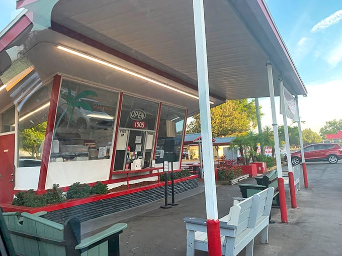 The unassuming exterior of Strawberry Hut proves once again that culinary treasures often hide in plain sight. Red and white charm awaits!