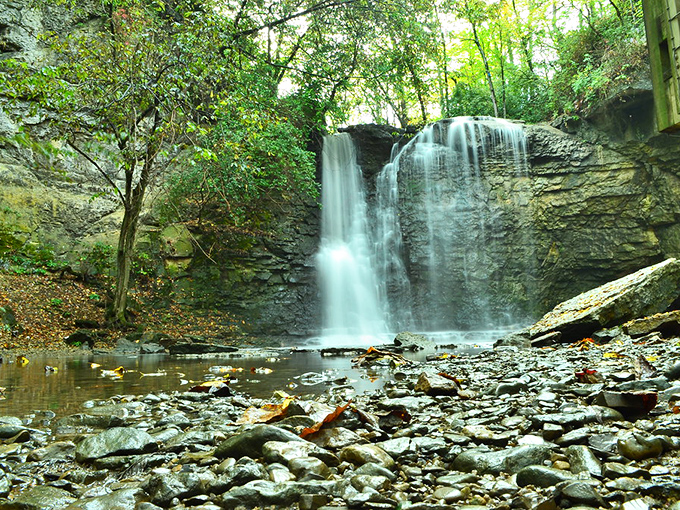 Nature's masterpiece in full flow &ndash; Hayden Falls creates a mesmerizing curtain of water against ancient limestone that's been perfecting its performance for millennia.