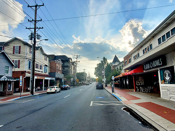 Main Street stretches before you like a storybook setting, where brick buildings and small-town charm create Newark's beating heart.