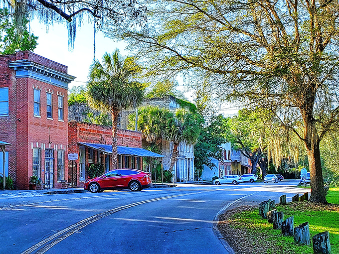 Cholokka Boulevard stretches before you like a movie set, where Spanish moss-draped oaks frame historic brick buildings that have witnessed centuries of Florida stories.