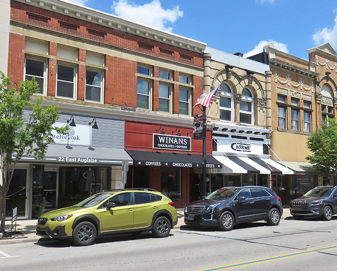 Downtown Wapakoneta's historic Wapa Theatre marquee stands like a sentinel of nostalgia, beckoning visitors into a Main Street that time politely decided to respect.