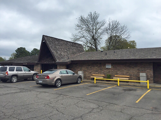 The unassuming A-frame entrance of Feltner's Whatta-Burger stands like a burger beacon in Russellville, promising no-frills deliciousness inside.