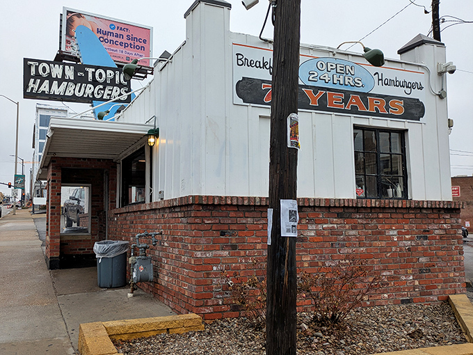 That neon glow isn't just a sign&mdash;it's a beacon of burger hope illuminating the Kansas City night, promising delicious salvation for hungry souls.