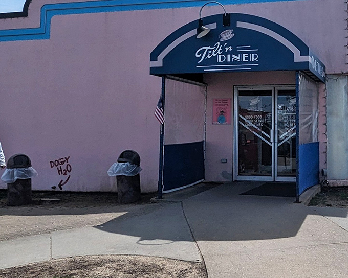 The blue-trimmed entrance of Tilt'n Diner promises exactly what we need: good food, good service, and good times&mdash;the holy trinity of diner perfection.